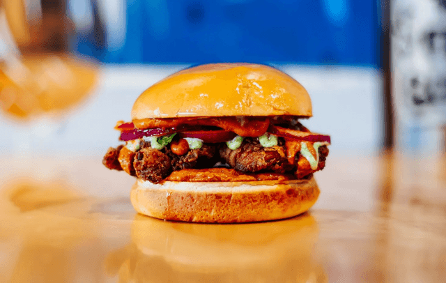 All the Indian-inspired WOAP burgers, reviewed and rated | The Spinoff